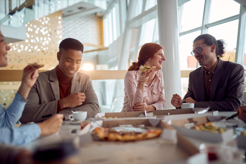 Young Group of People in Restaurant Lunch and Talks Stock Photo - Image ...