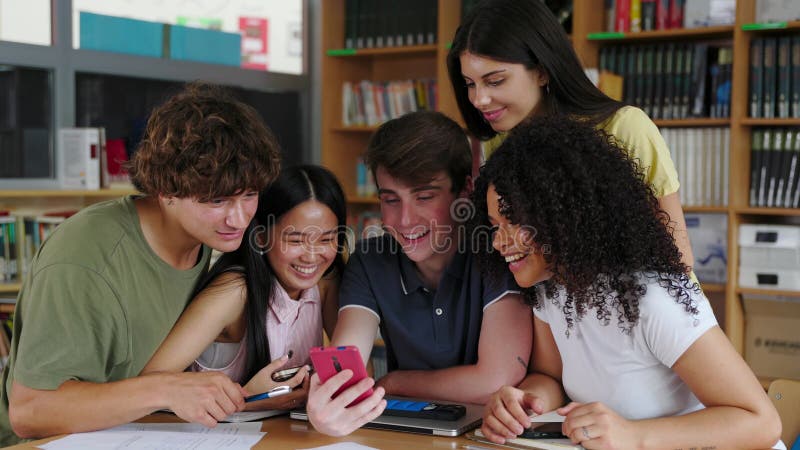 Group of Student Friends Having Fun Watching Social Media Content at ...