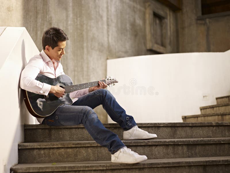 Young guitar player stock photo. Image of building, guitarist - 40660054