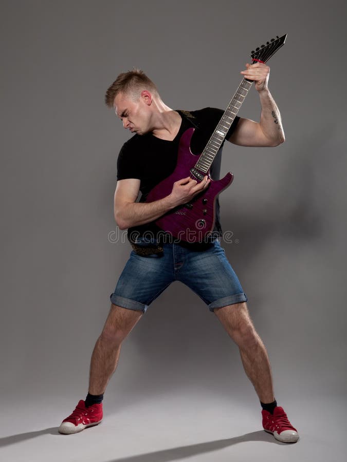 Young Guitarist Plays On The Electric Guitar Stock Photo - Image of ...
