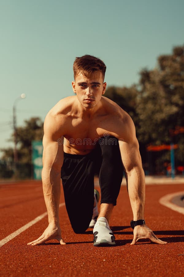 Young Guy with Athletic Body Getting Ready To Run Stock Photo - Image ...