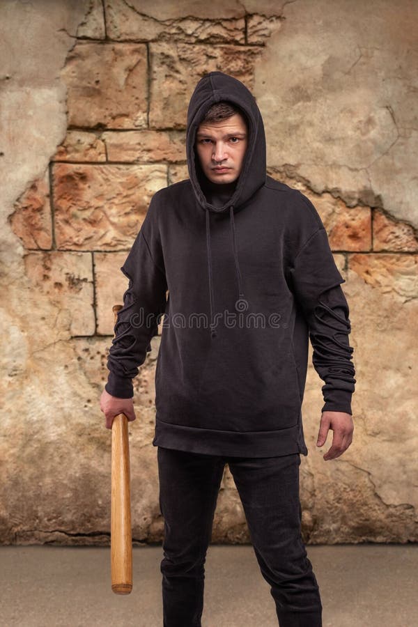A Young Guy with Baseball Bat at Wall Stock Photo - Image of methods ...