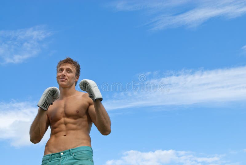 Young Guy in Boxing Gloves Training Outdoors Stock Image - Image of ...
