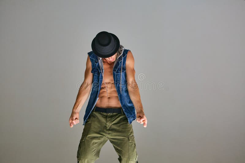 Stylish Young Guy Breakdancer Dancing in Suit Barefoot Isolated on Gray ...