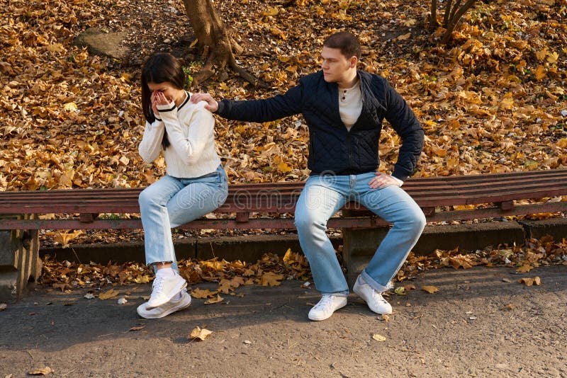 Young Guy Comforts His Crying Girlfriend Stock Photo - Image of autumn ...
