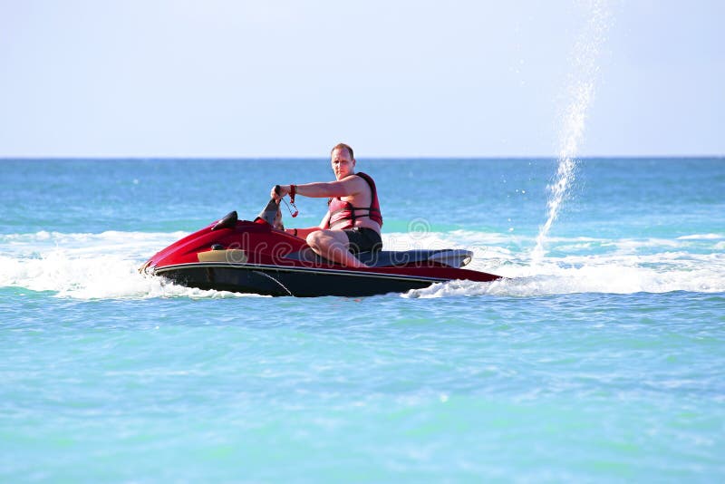 Young Guy Cruising on a Jet Ski Stock Image - Image of white, transport ...
