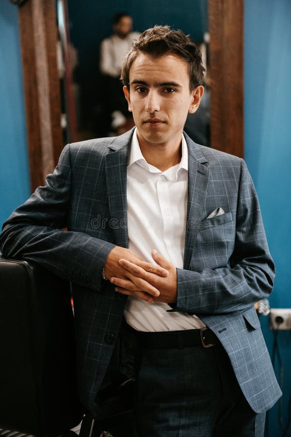 Young Guy in Grey Checkered Suit in Barbershop Stock Photo - Image of ...