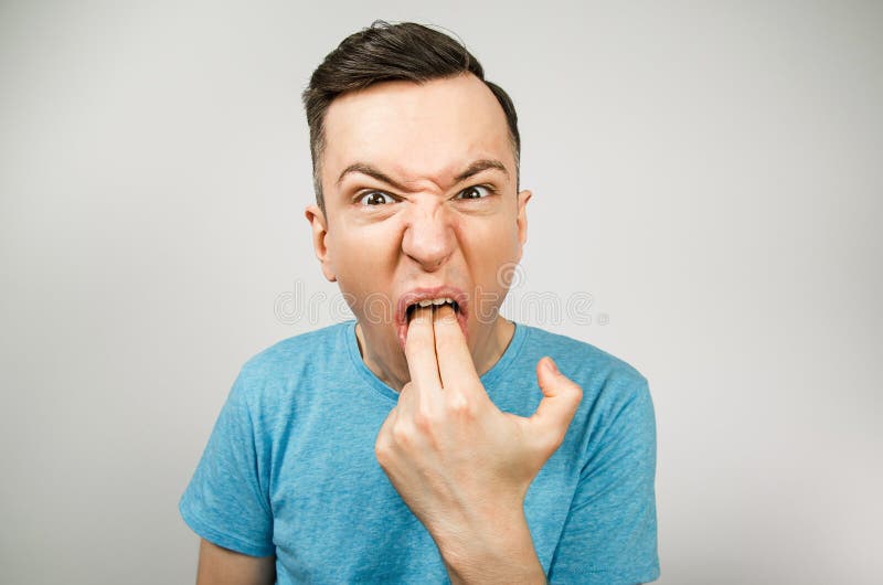 Young Guy Inserts Two Fingers in the Mouth To Induce Vomiting, on a ...