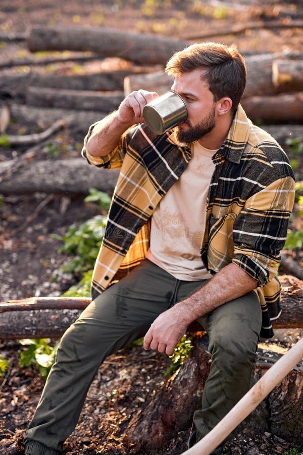 Young Guy Lumberman Sit Drinking Tea Having Rest after Chopping Trees ...