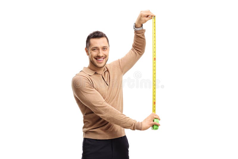 Young Guy with a Measuring Tape Looking at the Camera Stock Image ...