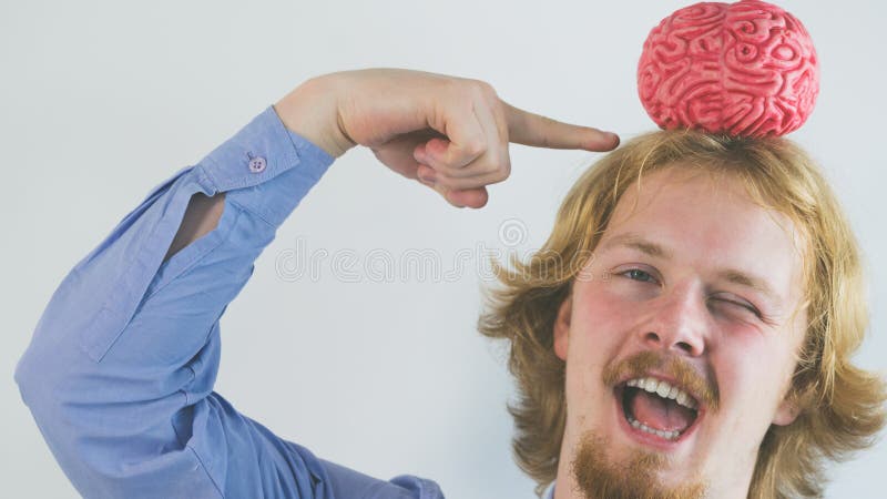 Man Playing with Human Brain Stock Photo - Image of ideas, mind: 124111630