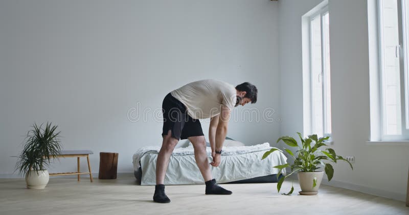 Young Guy Practicing Sport Activities, Doing Back Stretching Stock ...