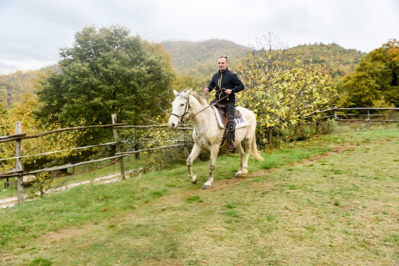 A Young Guy Riding a Horse. Stock Photo - Image of outdoor, male: 148021440
