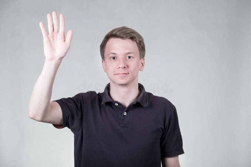 Young guy say hello stock image. Image of person, hand - 72894215