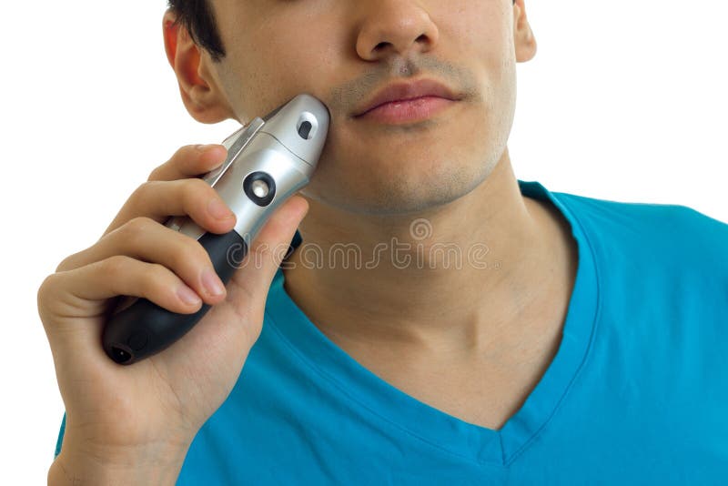 Young Guy Shaves His Beard Shaving Machines Using Close-up Stock Photo ...