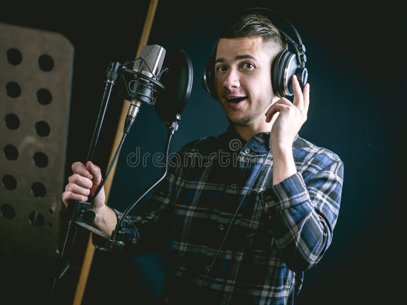 The Young Guy Singing in Recording Studio Stock Photo - Image of ...