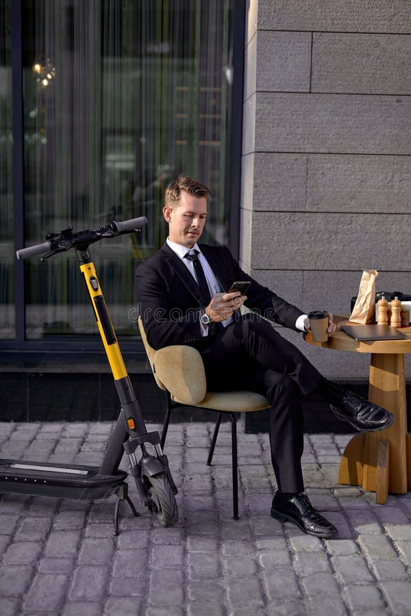 Young Man Sit Outdoors in Cafe Behind Table Using Laptop, Working ...