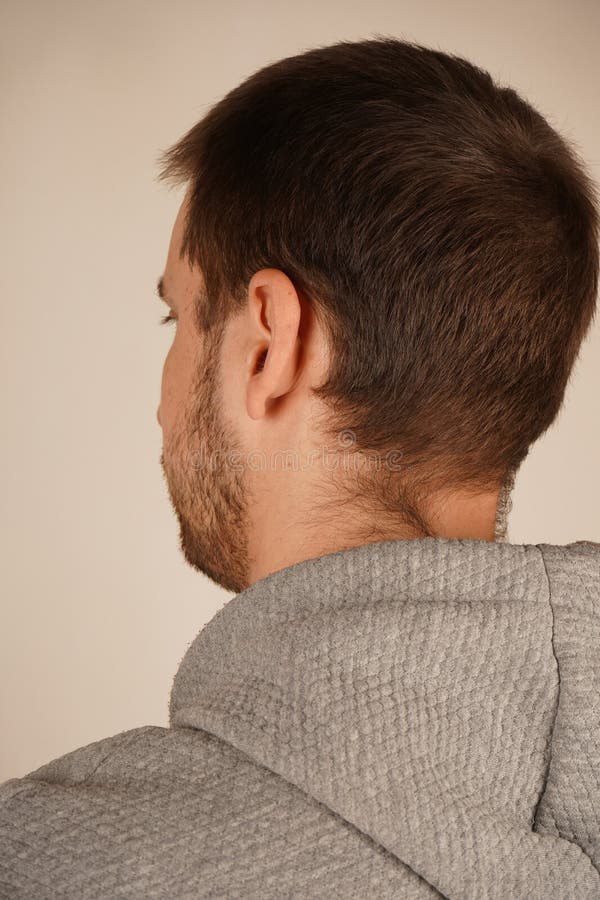 Young Guy Standing in Front of Camera. Man Looking at Side. Head from ...