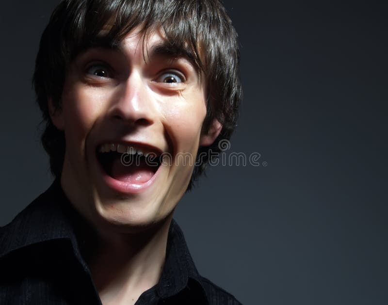 Young guy is surprised stock photo. Image of leer, pretty - 5236994