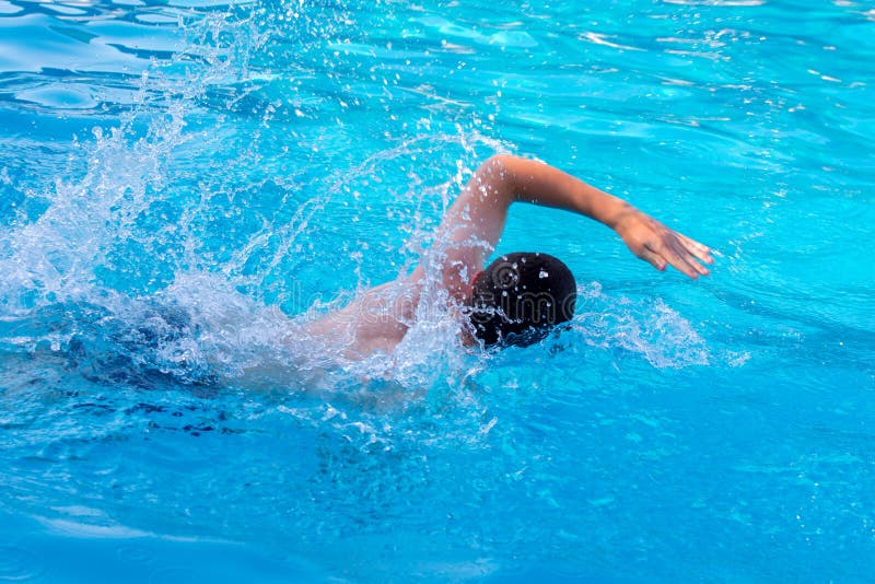 Young Guy Swims in the Pool. Rest at the Resort_ Stock Photo - Image of ...