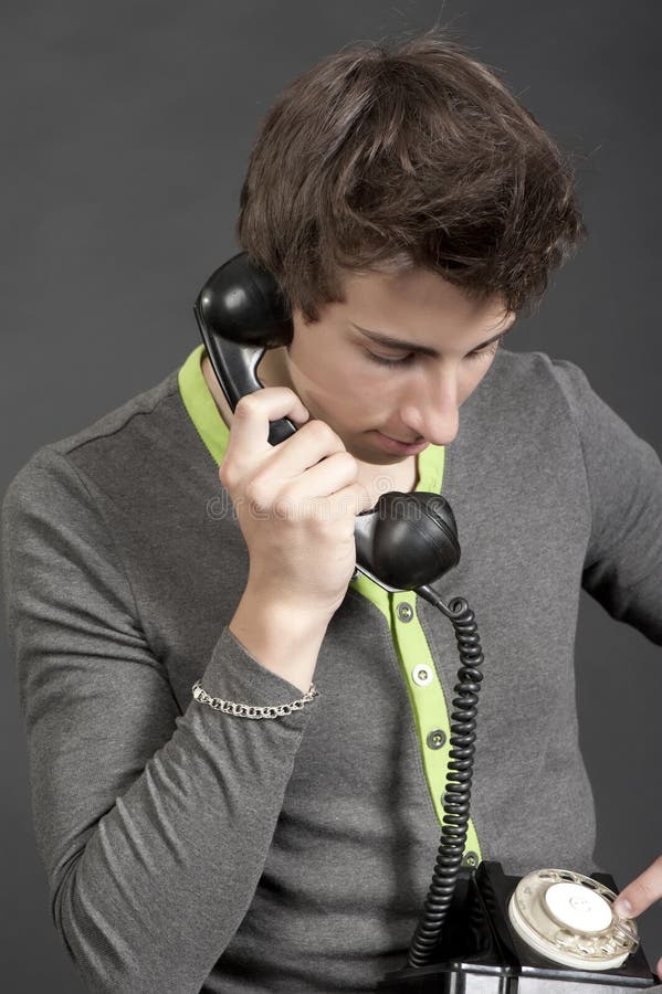 Young Guy Talking on the Old Phone Stock Image - Image of handset ...