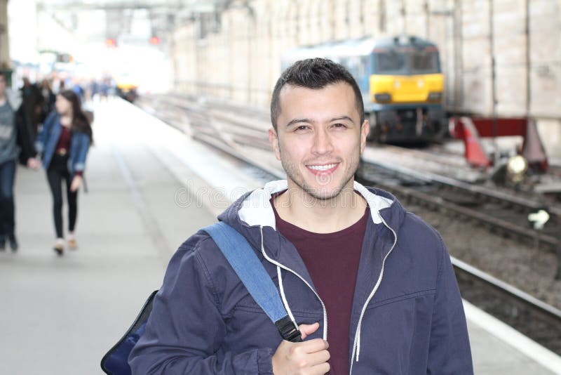 Young guy in train station stock photo. Image of outside - 213632848