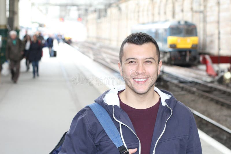 Young guy in train station stock image. Image of latino - 213632857