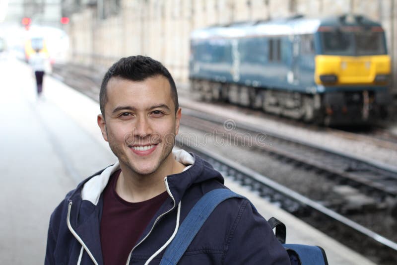 Young guy in train station stock image. Image of attractive - 213632881