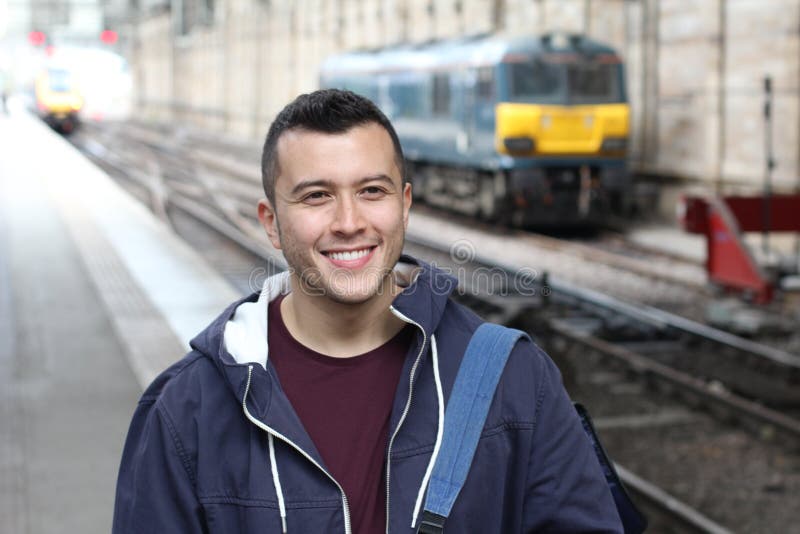 Young guy in train station stock photo. Image of leather - 213632894