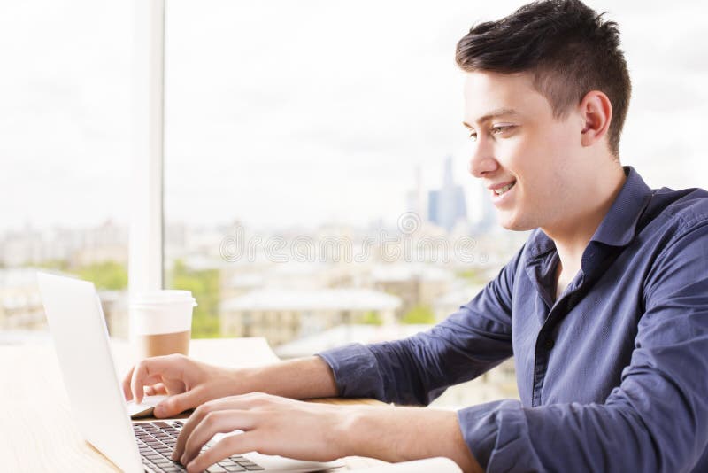 Smart Smiling Guy Working on Laptop Stock Image - Image of person ...