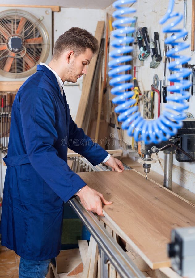 Young Guy Using Machine To Process Plank Stock Photo - Image of male ...