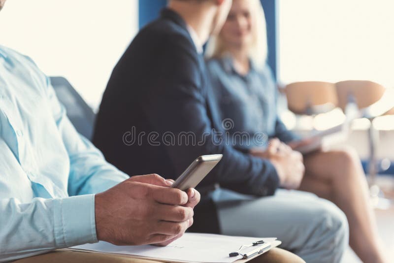 Young Guy Waiting in Queue for Work Interview Indoor Stock Photo ...