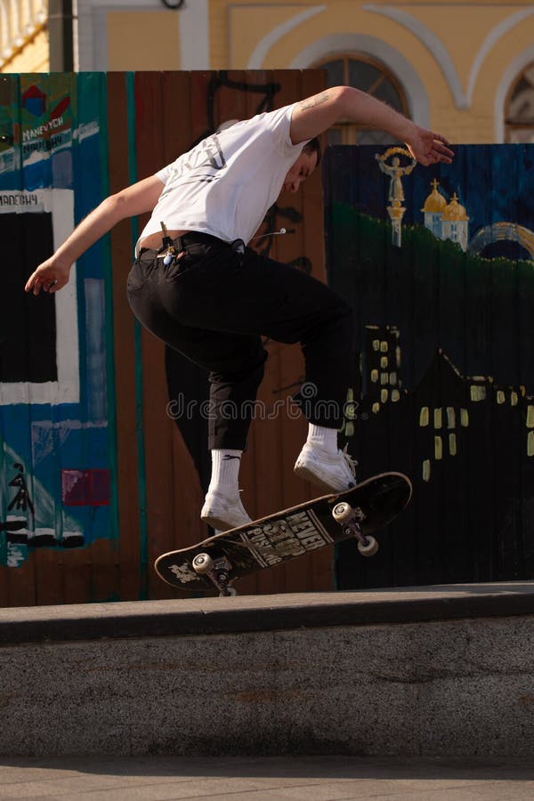Young Guys in Stylish Clothes Ride a Skateboard Editorial Photo - Image ...