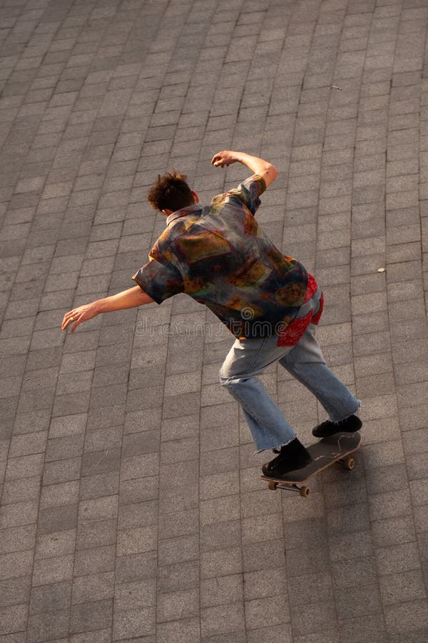 Young Guys in Stylish Clothes Ride a Skateboard Editorial Photo - Image ...