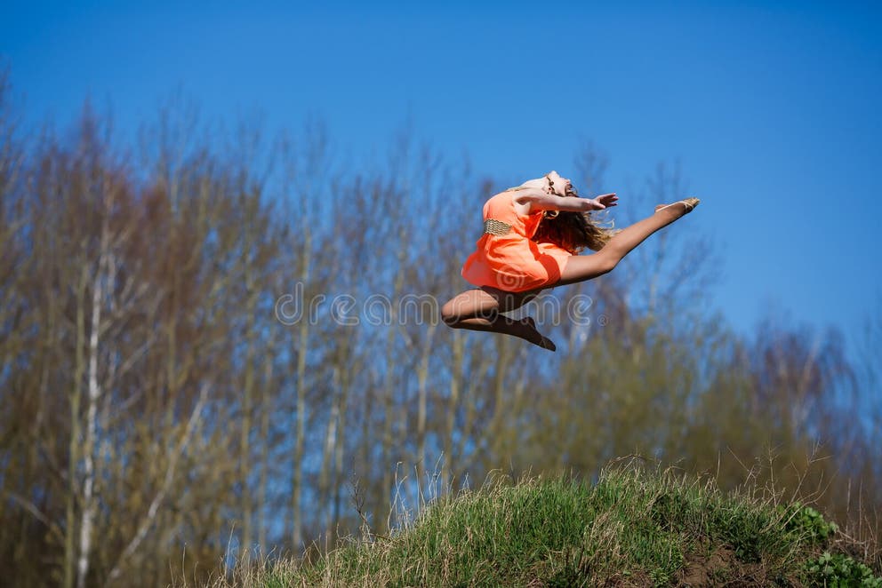 Young Gymnast Doing Exercises Stock Photo - Image of leisure, forest ...
