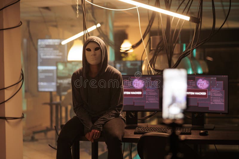 Young Hacker with Anonymous Mask Attacking Computer Server Stock Photo - Image of live ...
