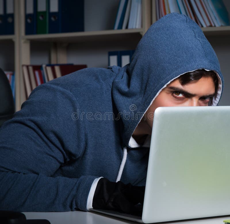 Young Hacker Hacking into Computer at Night Stock Photo - Image of ...
