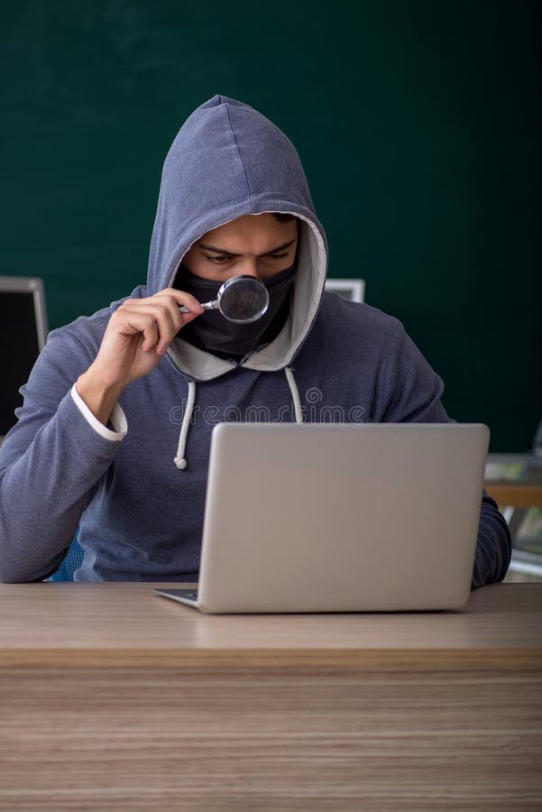 Young Male Hacker Sitting in the Classroom Stock Image - Image of cyber ...