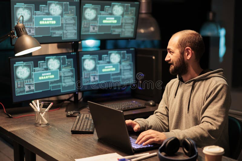 Young Hacker Stealing Programming Data from Server, Stock Photo - Image ...
