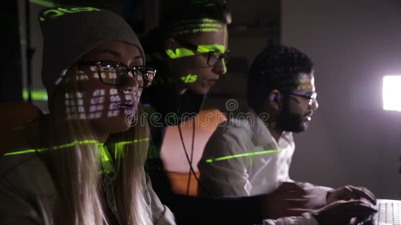 Young Hacker Team Working on a Computer. Cybercrime, Cyber Attack ...