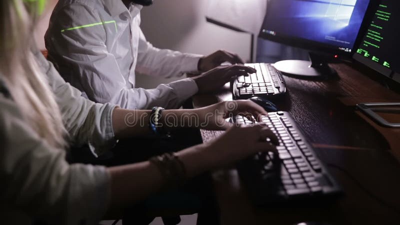 Computer Lab with a Young Man with a Prosthetic Hand Working with a ...