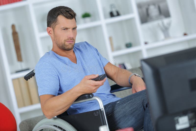Handicapped Man Using Tv Remote Control Stock Image - Image of ...