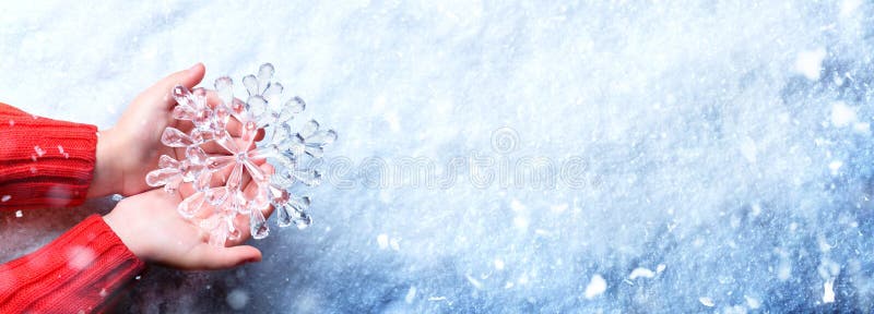 Young Hands Holding Snowflake - Winter Concept Stock Photo - Image of ...