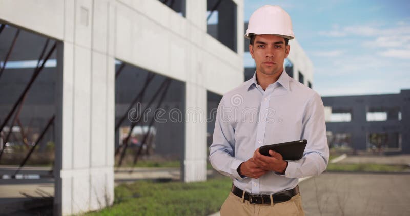 Young Handsome Architect at Construction Site Holding Modern Tablet ...