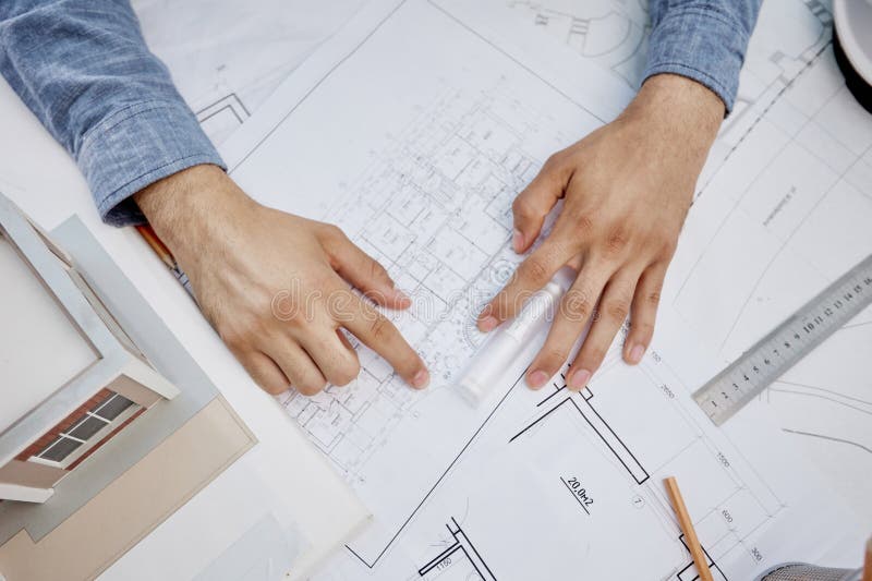 Young Handsome Architect Engineer Working on Design Plan Stock Photo ...