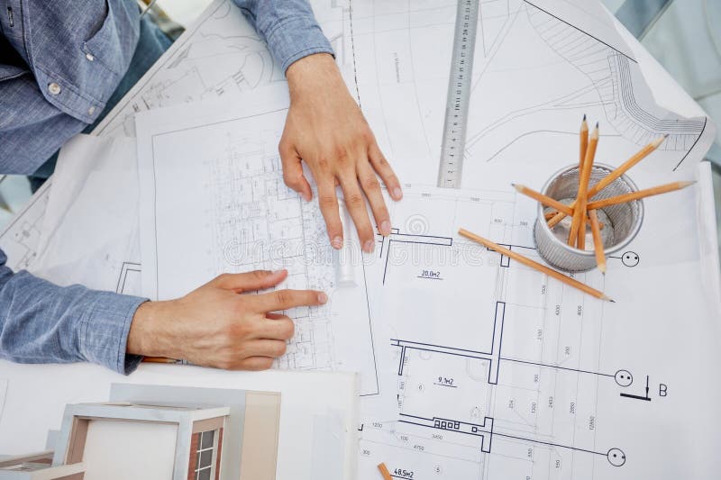 Young Handsome Architect Engineer Working on Design Plan Stock Image ...