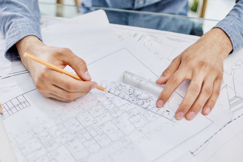 Young Handsome Architect Engineer Working on Design Plan Stock Photo ...