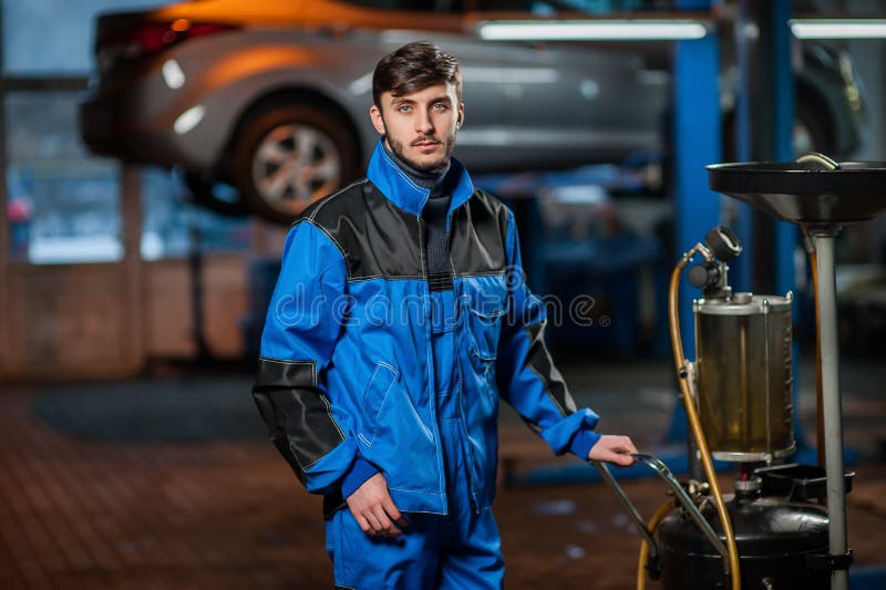 Young Handsome Auto Mechanic at Work Stock Photo - Image of tool ...