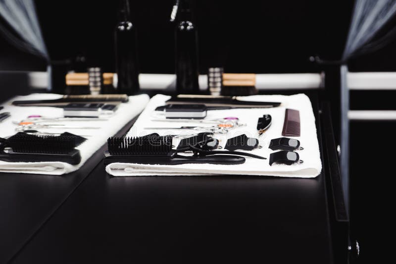 Young Handsome Barber Making Haircut, Instruments in Barbershop Stock ...