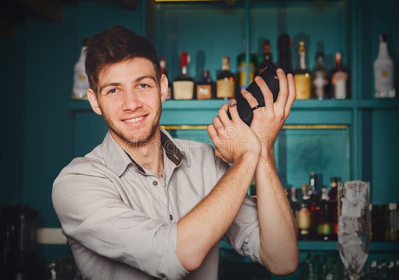 Young Handsome Barman in Bar Shaking and Mixing Alcohol Cocktail Stock ...